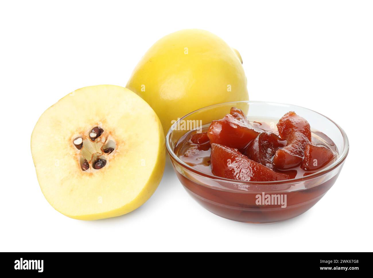 Tasty homemade quince jam in bowl and fruits isolated on white Stock ...