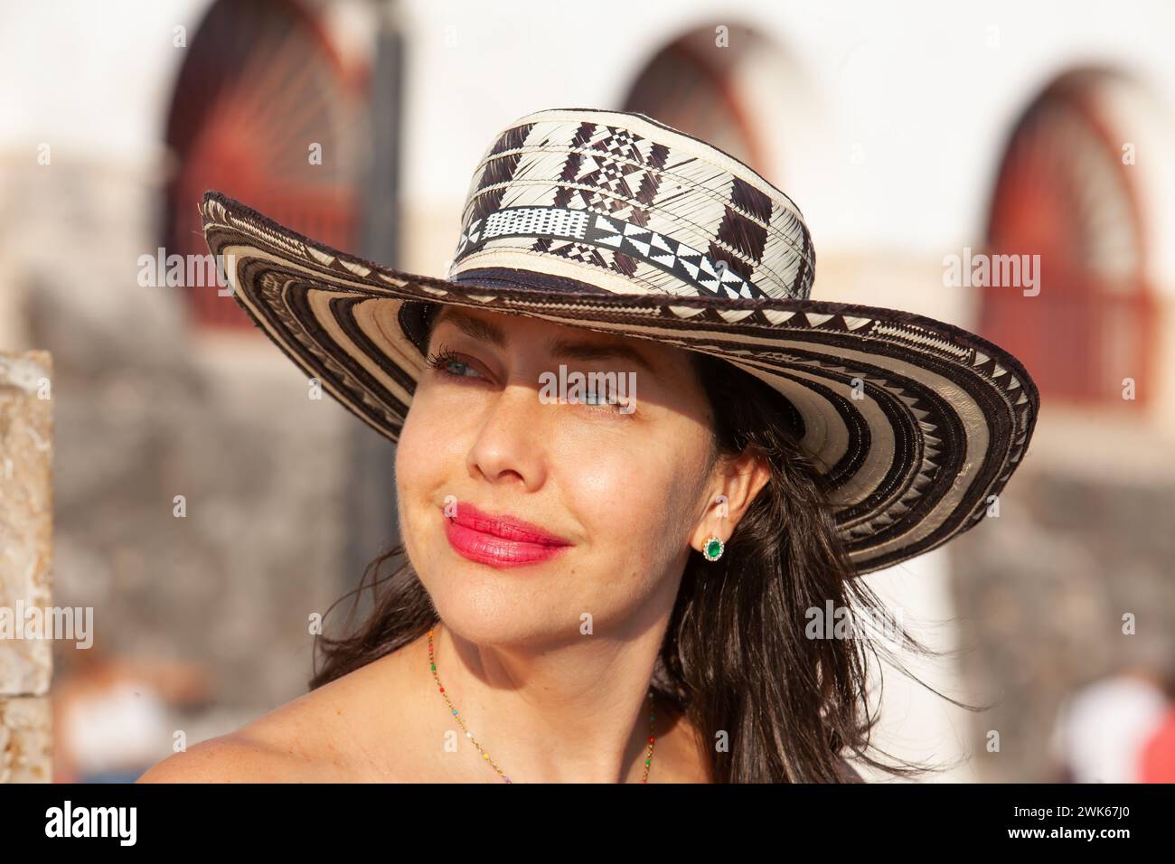 Beautiful woman wearing the traditional Colombian hat called Sombrero ...