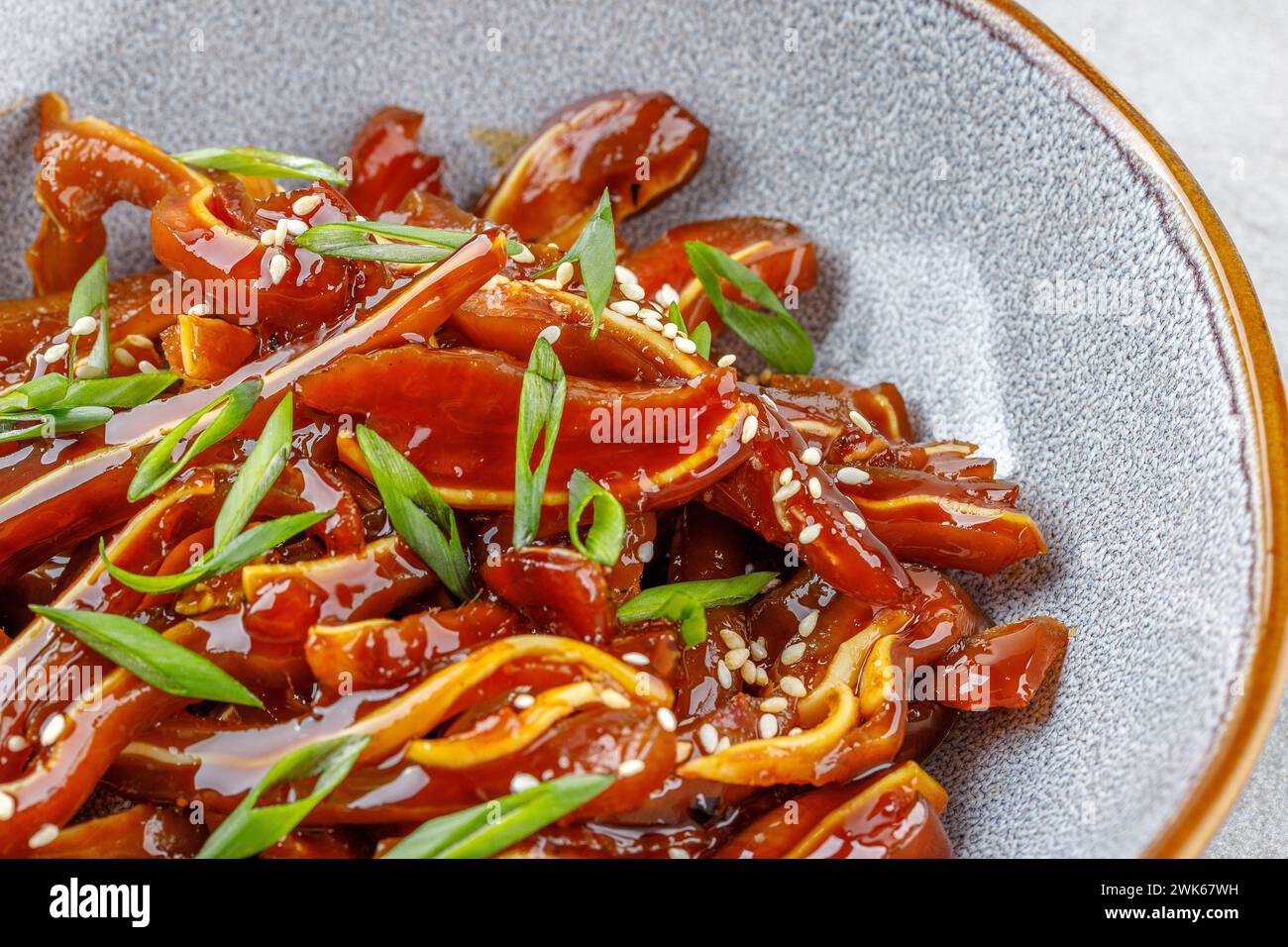 appetizer of pig ears with sauce studio food photo 4 Stock Photo - Alamy