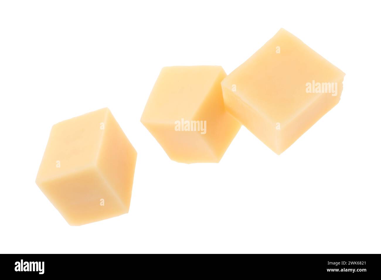 Cubes of tasty cheese isolated on white Stock Photo - Alamy