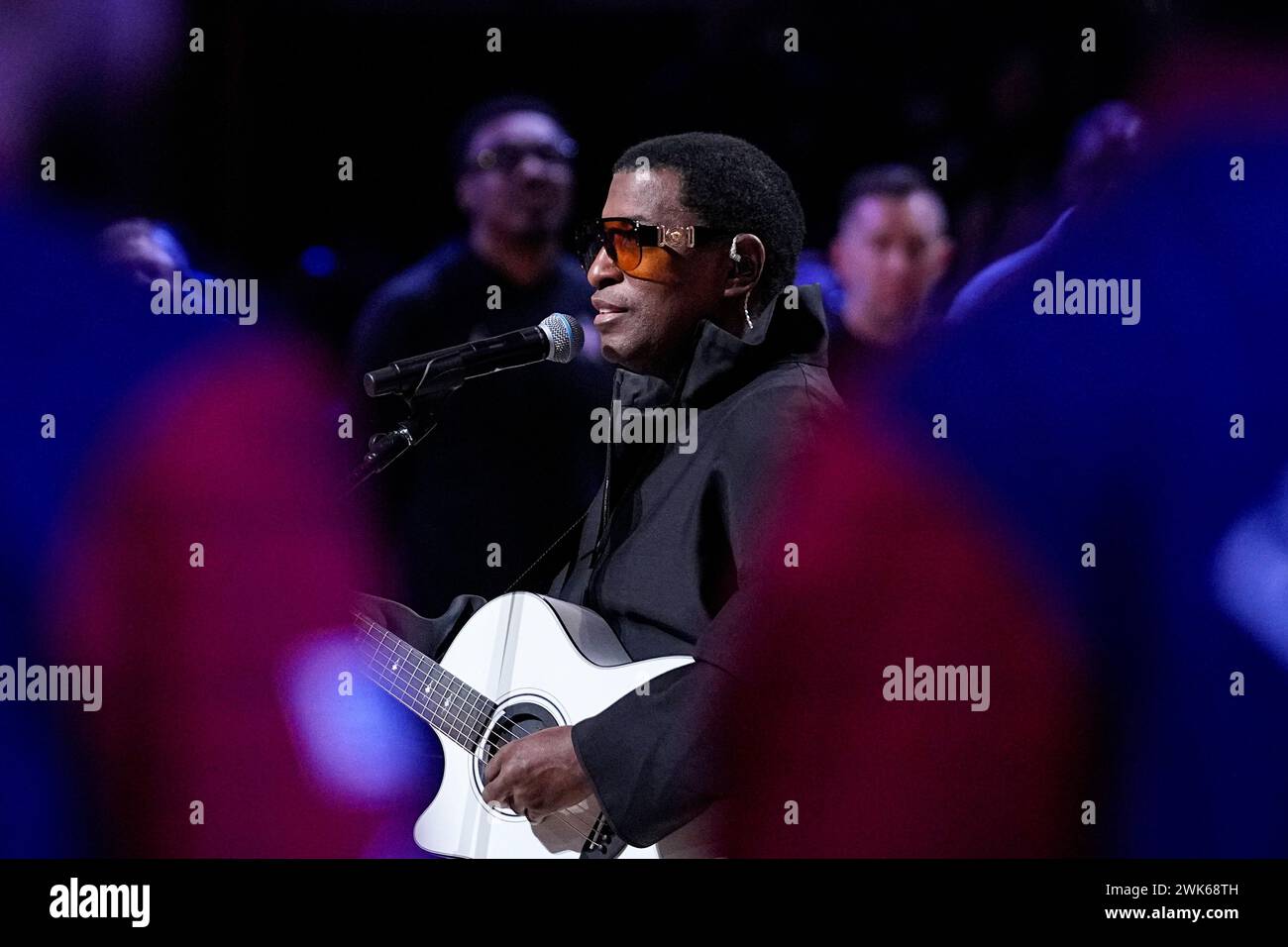 Babyface performs the National Anthem before the start of the NBA All ...