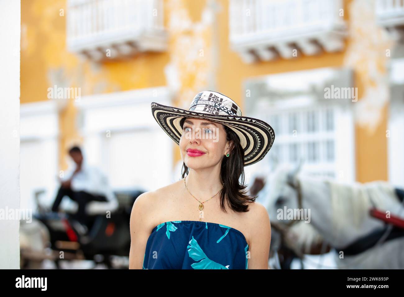 Beautiful woman wearing the traditional Colombian hat called Sombrero ...
