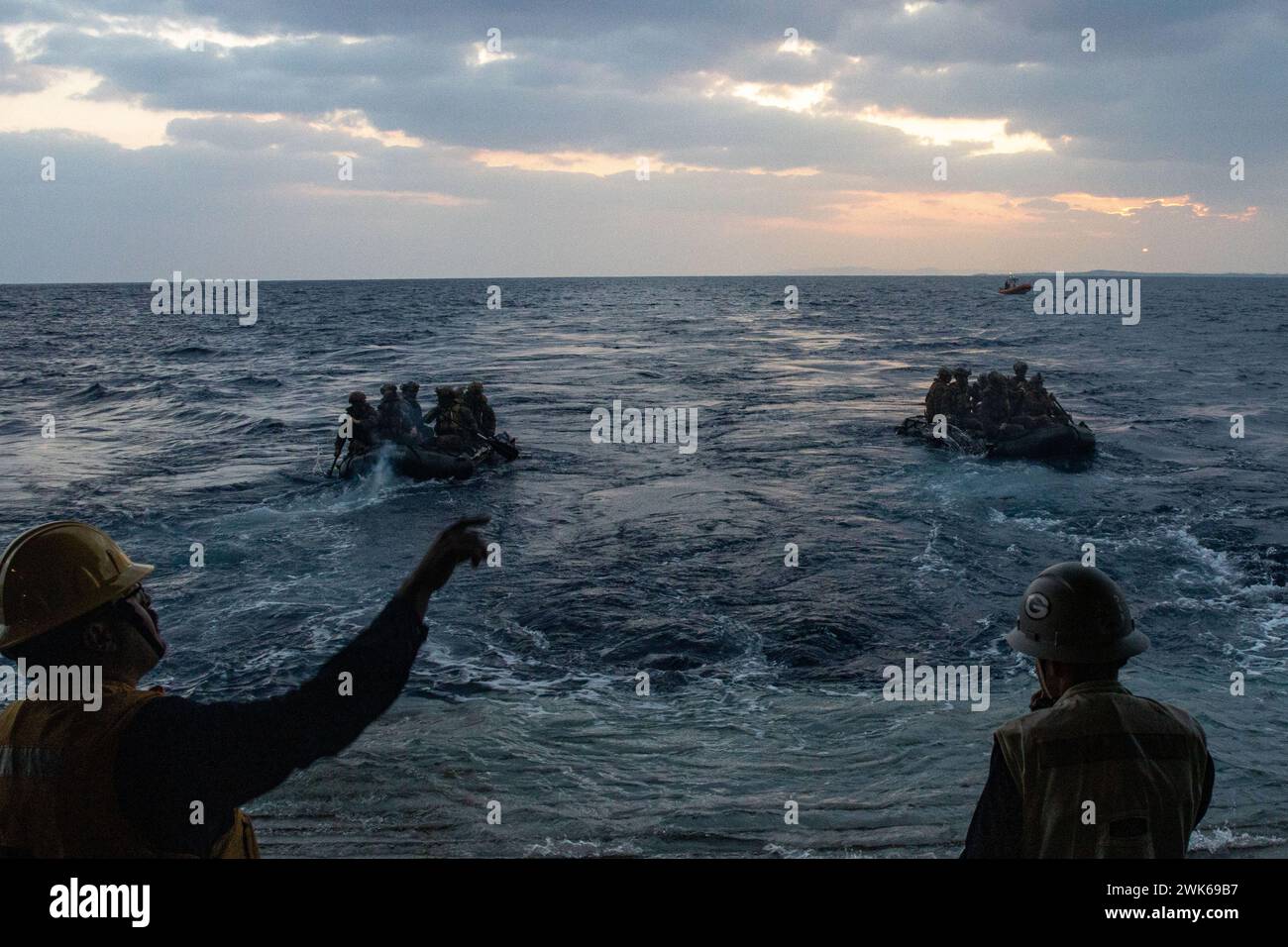 U.S. Navy Sailors assigned to the amphibious docking ship USS Green Bay ...