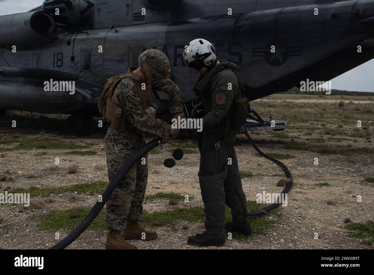 U.S. Marine Corps Lance Cpl. Tyler Kellogg, left, a bulk fuel ...