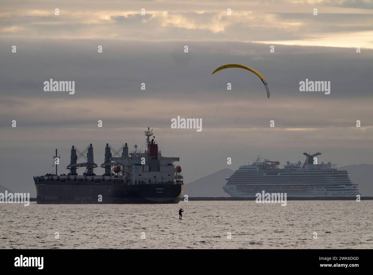 Kite surfer Robert Rice hydrofoils off the Belmont Shore in Long Beach ...