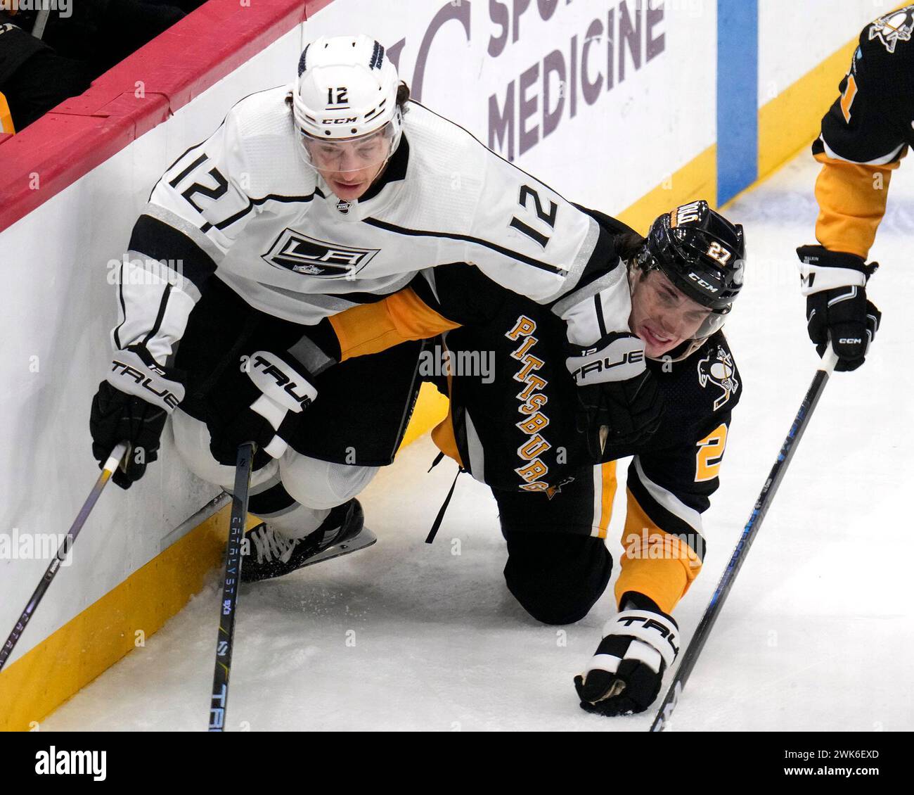 Los Angeles Kings' Trevor Moore (12) and Pittsburgh Penguins' Ryan ...