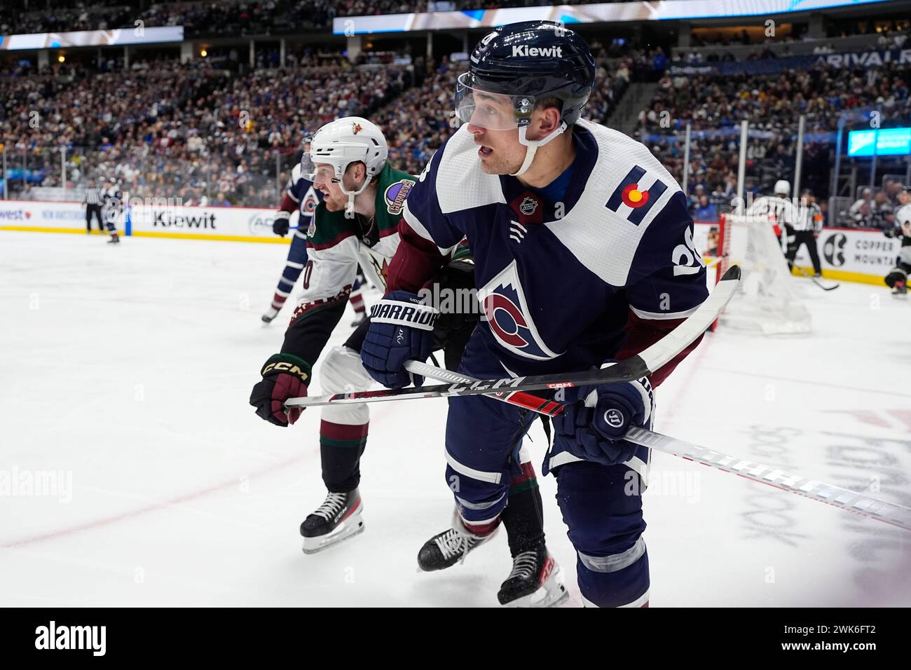 Colorado Avalanche left wing Miles Wood, front, looks for a pass as ...