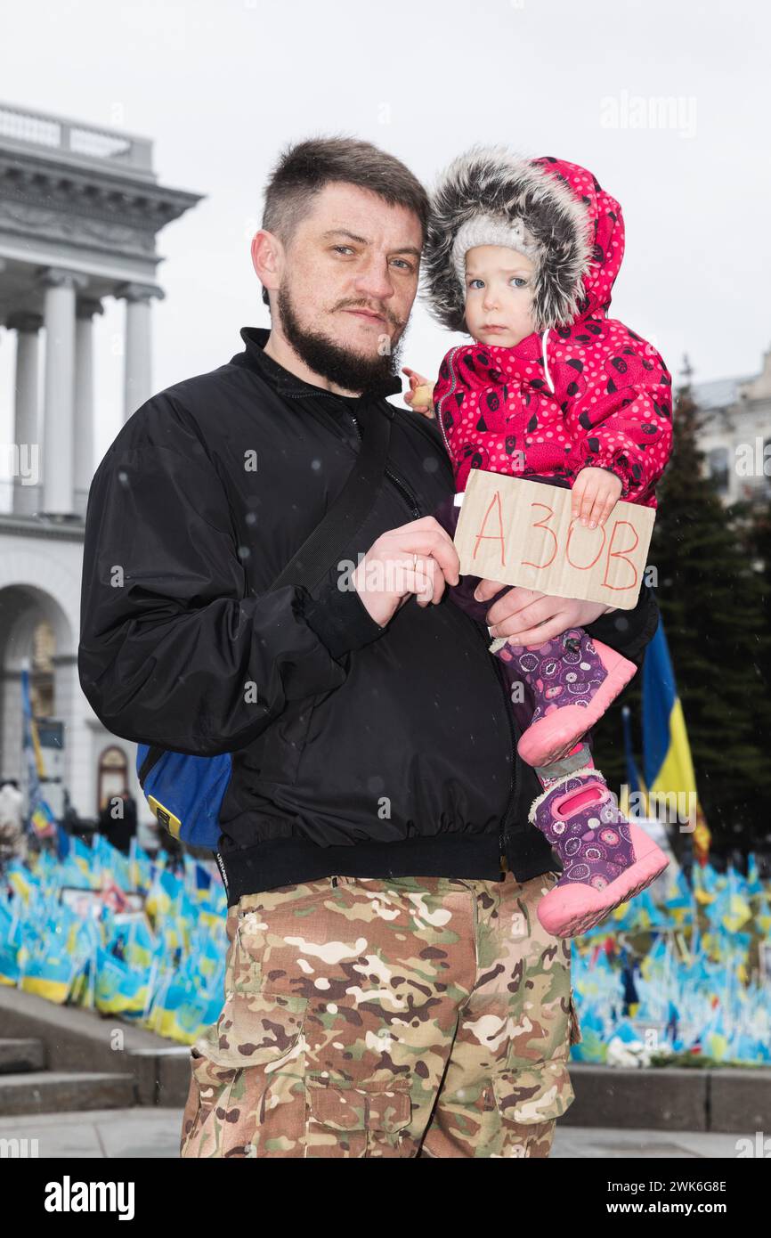 A protester holds a placard during the rally. On Sunday, the ...