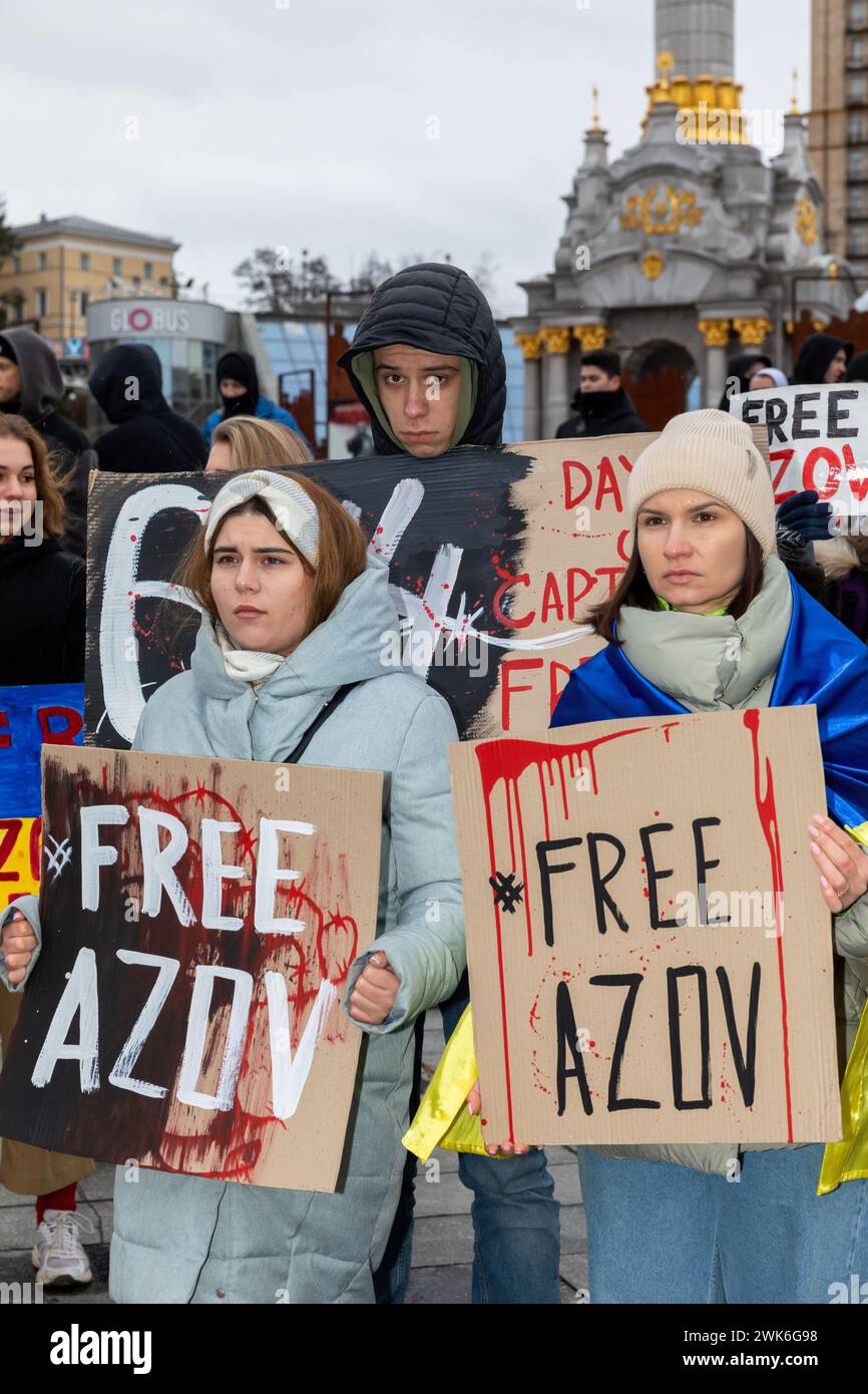 Protesters hold Free Azov placards during a rally. On Sunday, the ...