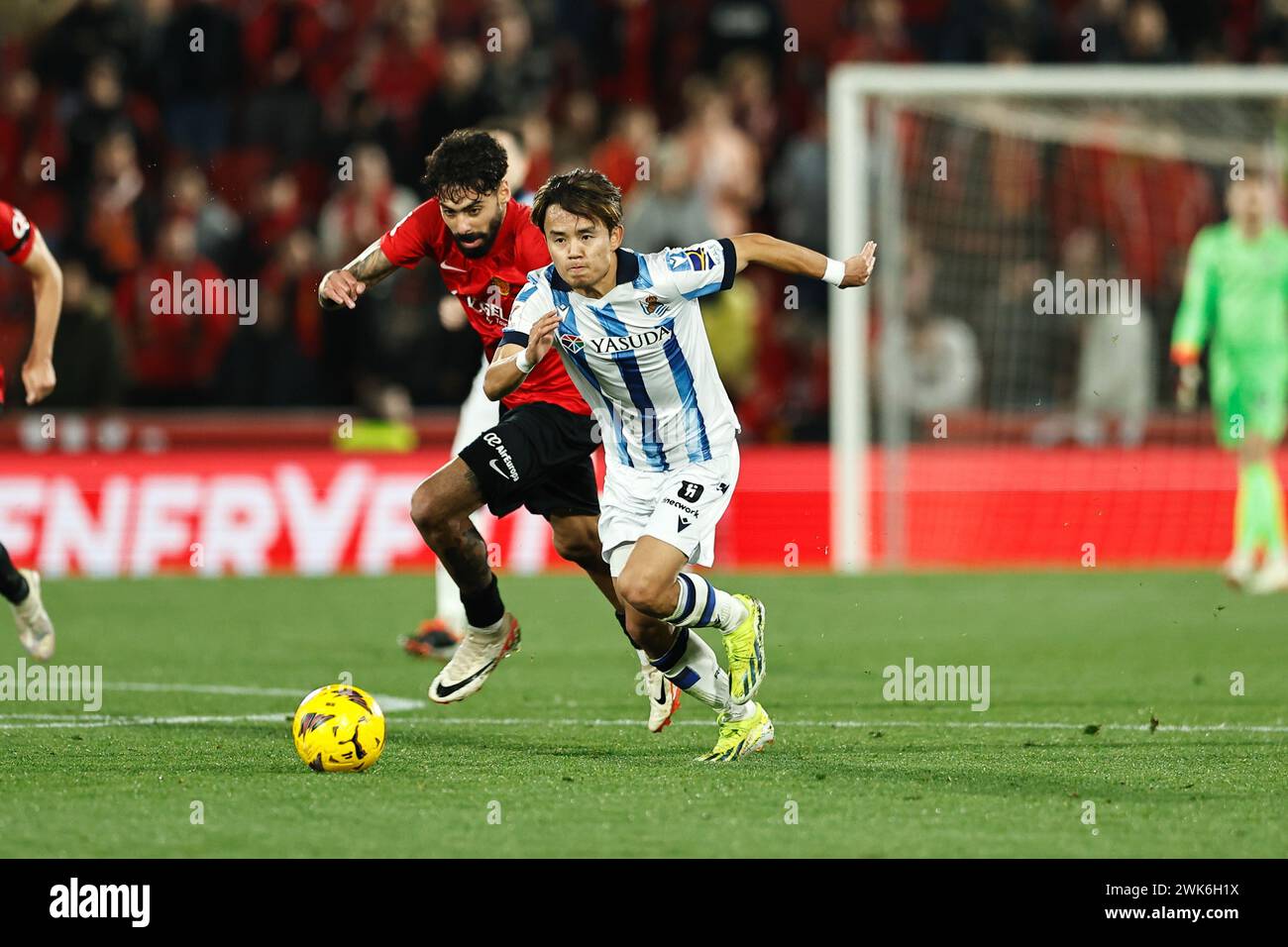 Palma de Mallorca, Spain. 18th Feb, 2024. (L-R) Samu Costa (Mallorca), Takefusa Kubo (Sociedad ...
