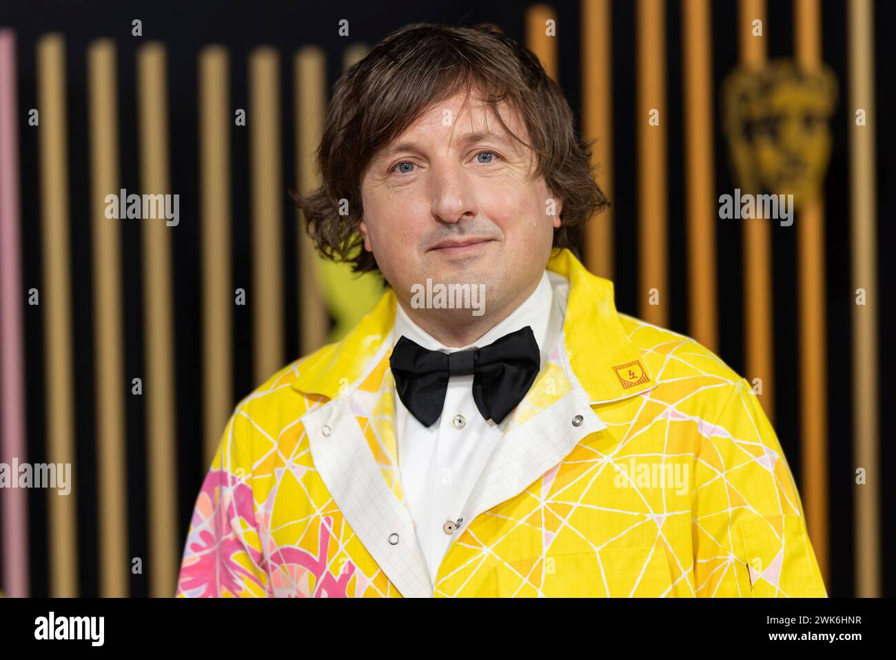 Composer Daniel Pemberton poses for photographers upon arrival at the ...