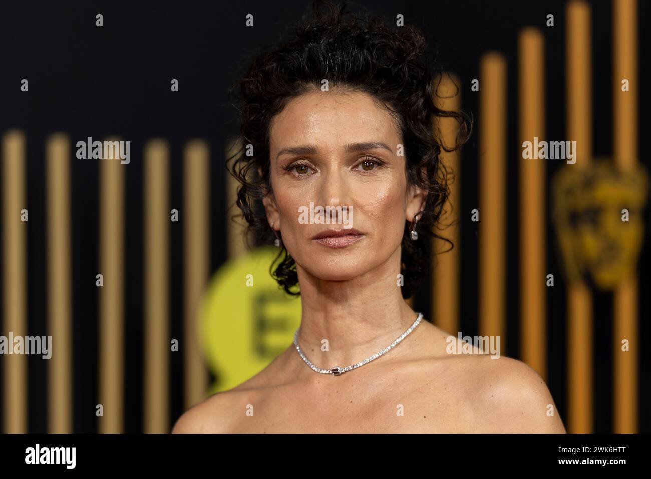 Indira Varma poses for photographers upon arrival at the 77th British ...