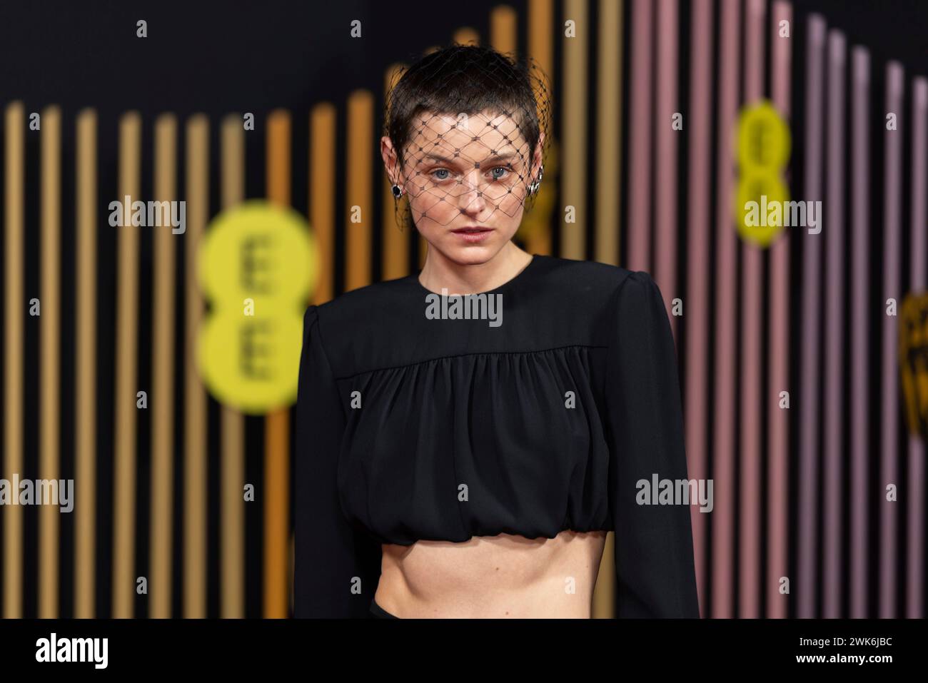 Emma Corrin poses for photographers upon arrival at the 77th British ...