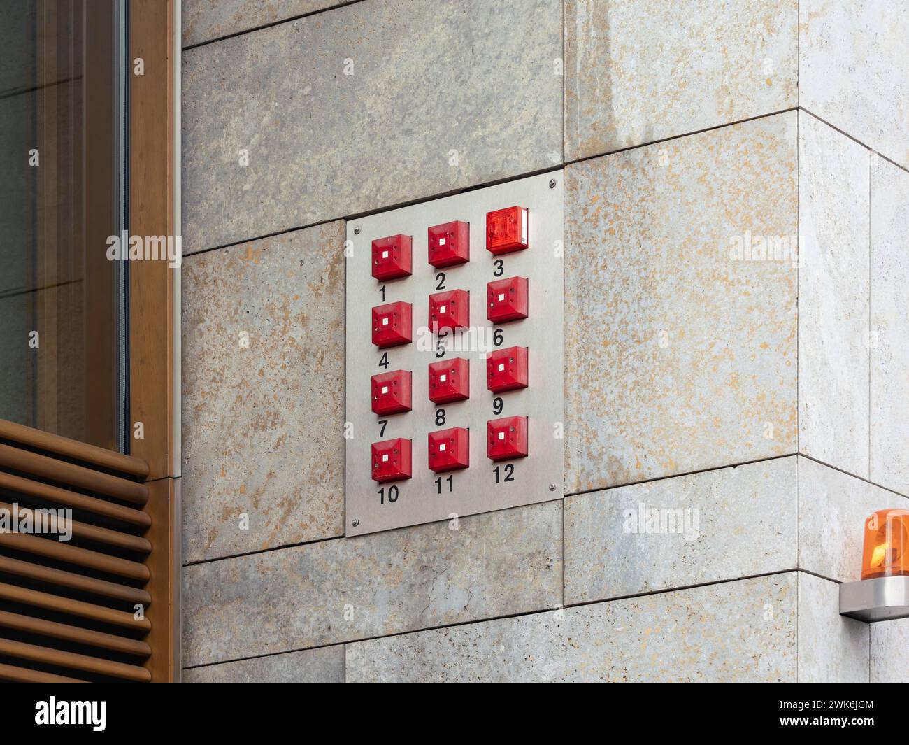 Fire alarm system lights on an office building exterior indicating the ...