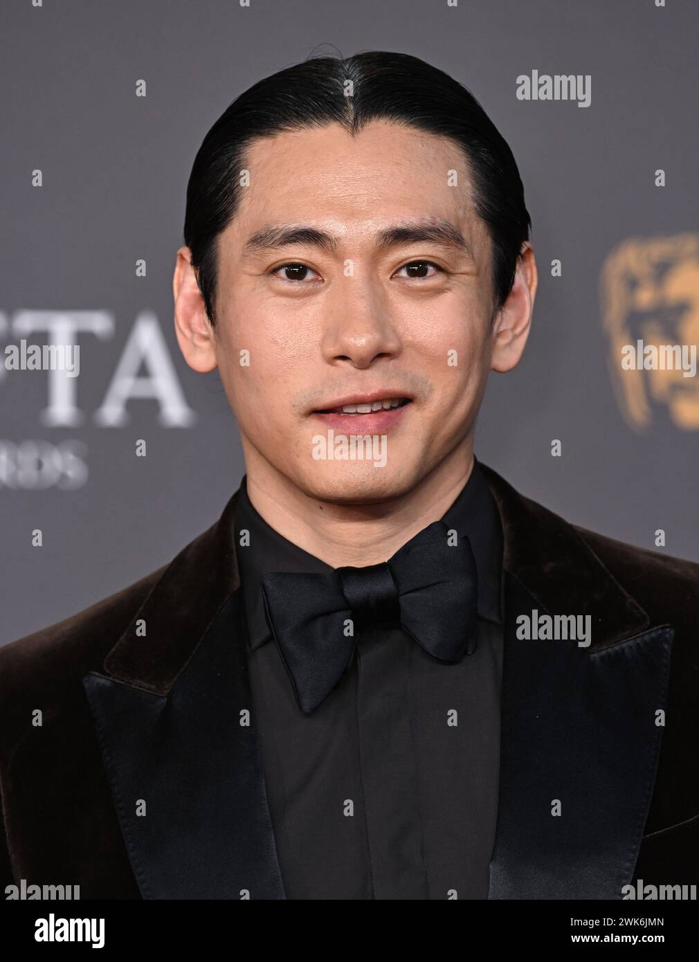 London, UK. February 18th, 2024. Teo Yoo arriving at the 2024 EE BAFTA ...