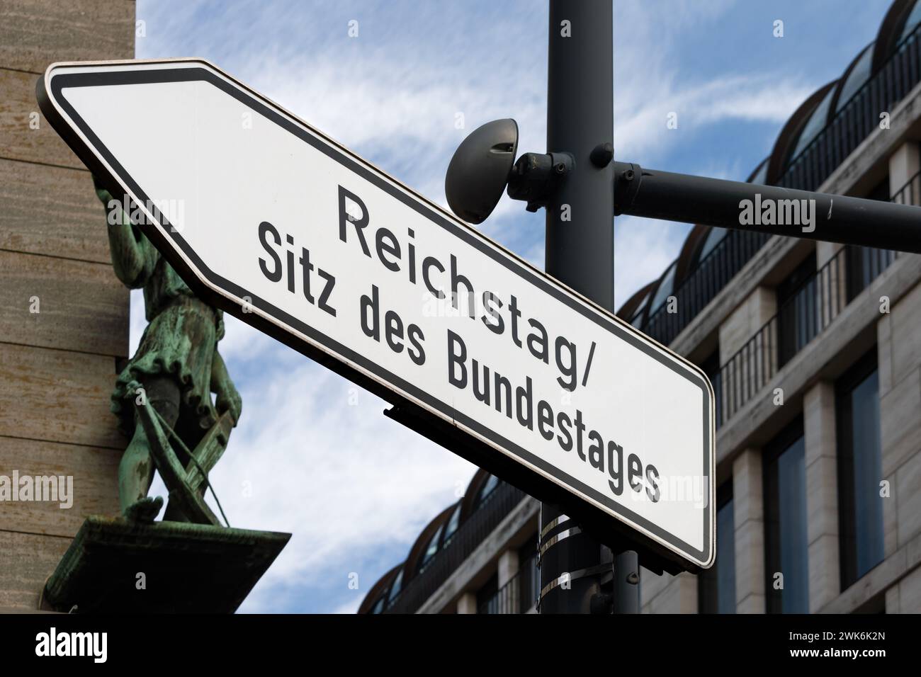 Reichstag and Sitz des Bundestages sign (German parliament) on a post ...