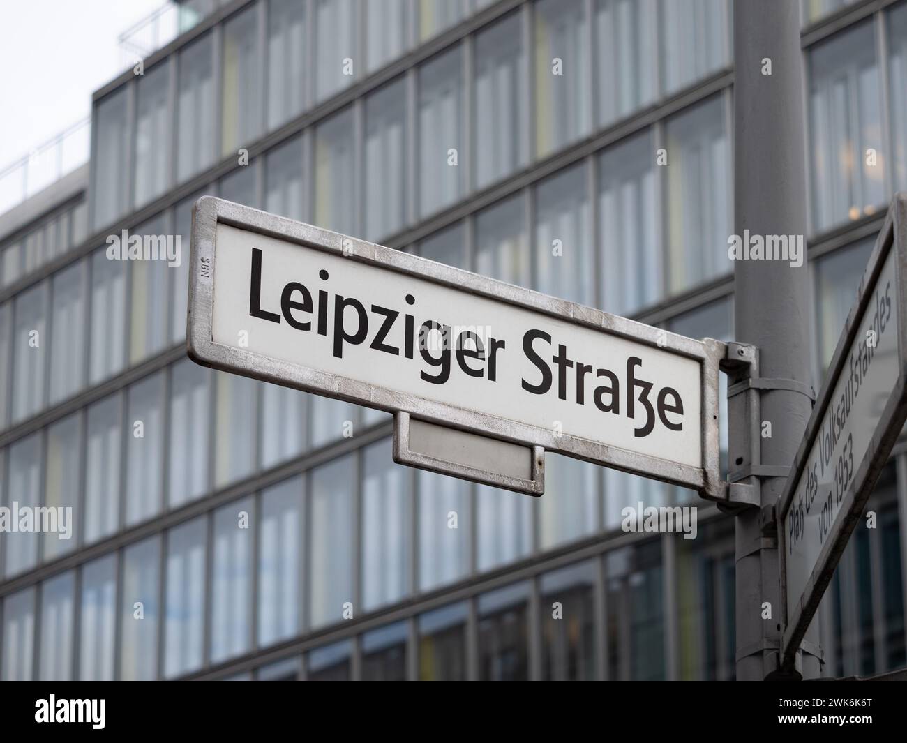 Leipziger Straße in Berlin. Sign with the road name at an intersection ...