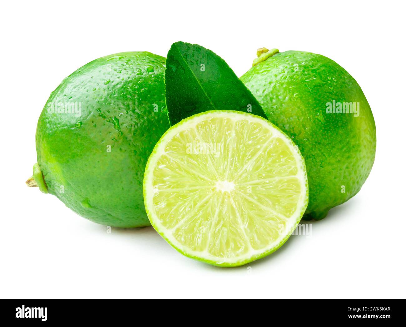 Front view of green lemon fruits with half and leaf is isolated on ...