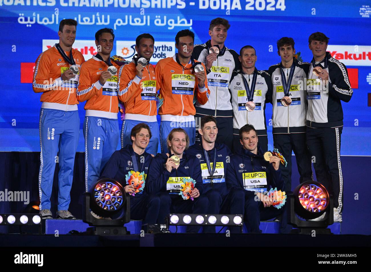 Doha, Qatar. 18th Feb, 2024. Gold medalist team USA (below), silver medalist team the ...