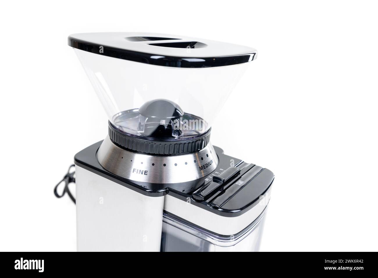 Espresso bean coffee grinder. Brand new clean machine over white, close ...