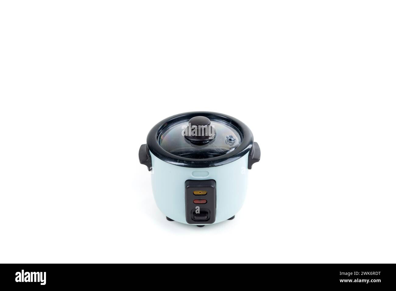 Tiny blue toy rice cooker with lid over white Stock Photo - Alamy