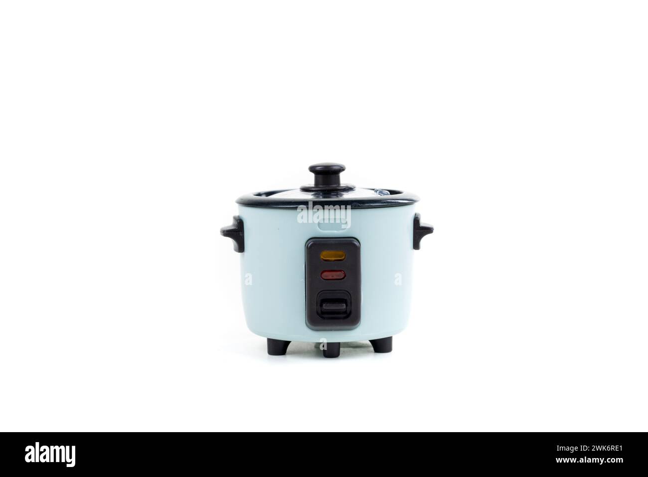 Tiny blue toy rice cooker with lid isolated over white Stock Photo - Alamy