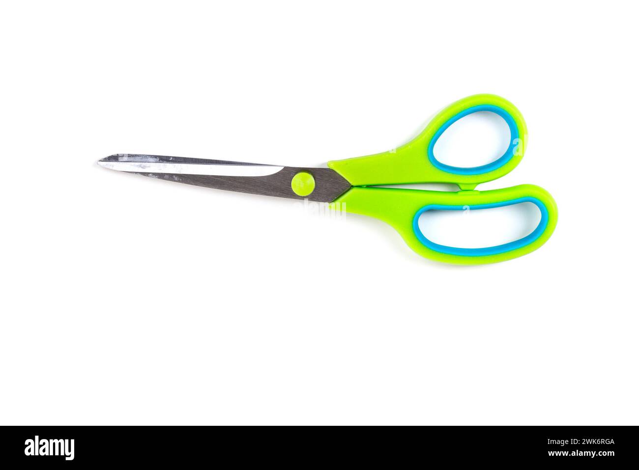 Green and blue handled scissors isolated over white Stock Photo - Alamy