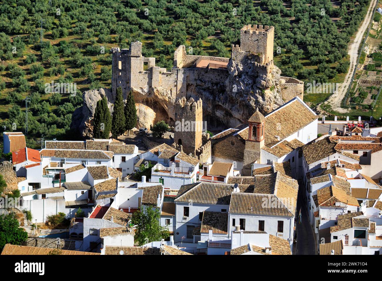 Whitewashed houses, view from above of Moorish-style castle, Route of ...