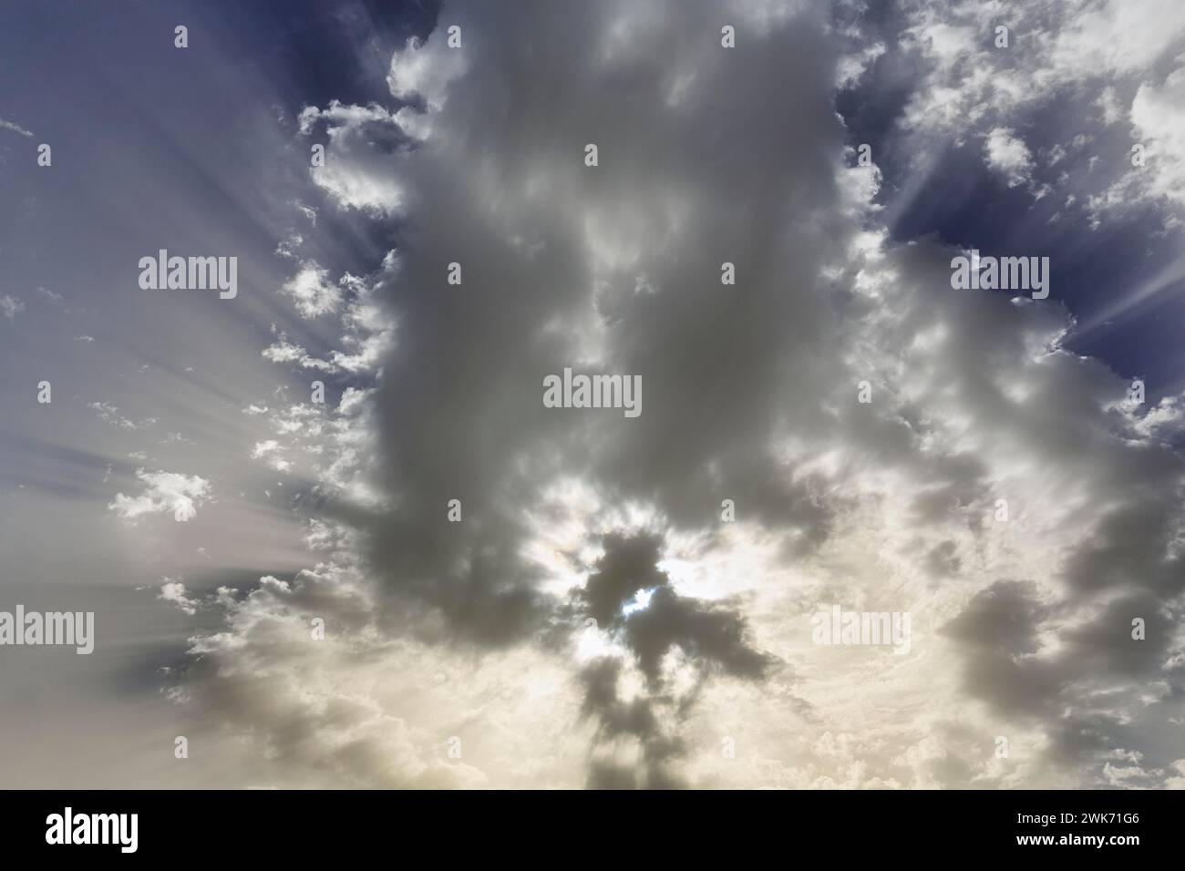 Rays of sun, rays of light behind clouds, dramatic cloudy sky, Granada, Andalusia Stock Photo ...
