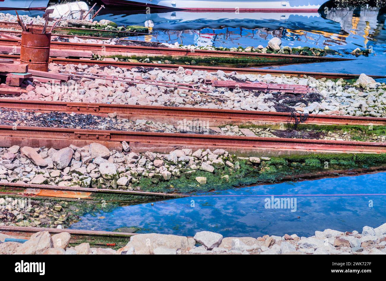Ship launching rails at edge of water at seaport in Mokpo, South Korea ...