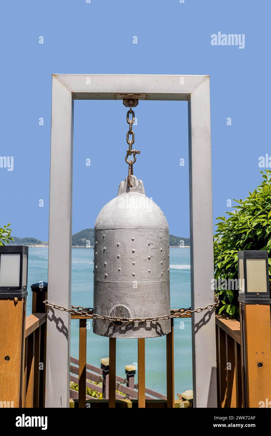 Antique lighthouse warning bell at marine park in Mokpo, South Korea ...