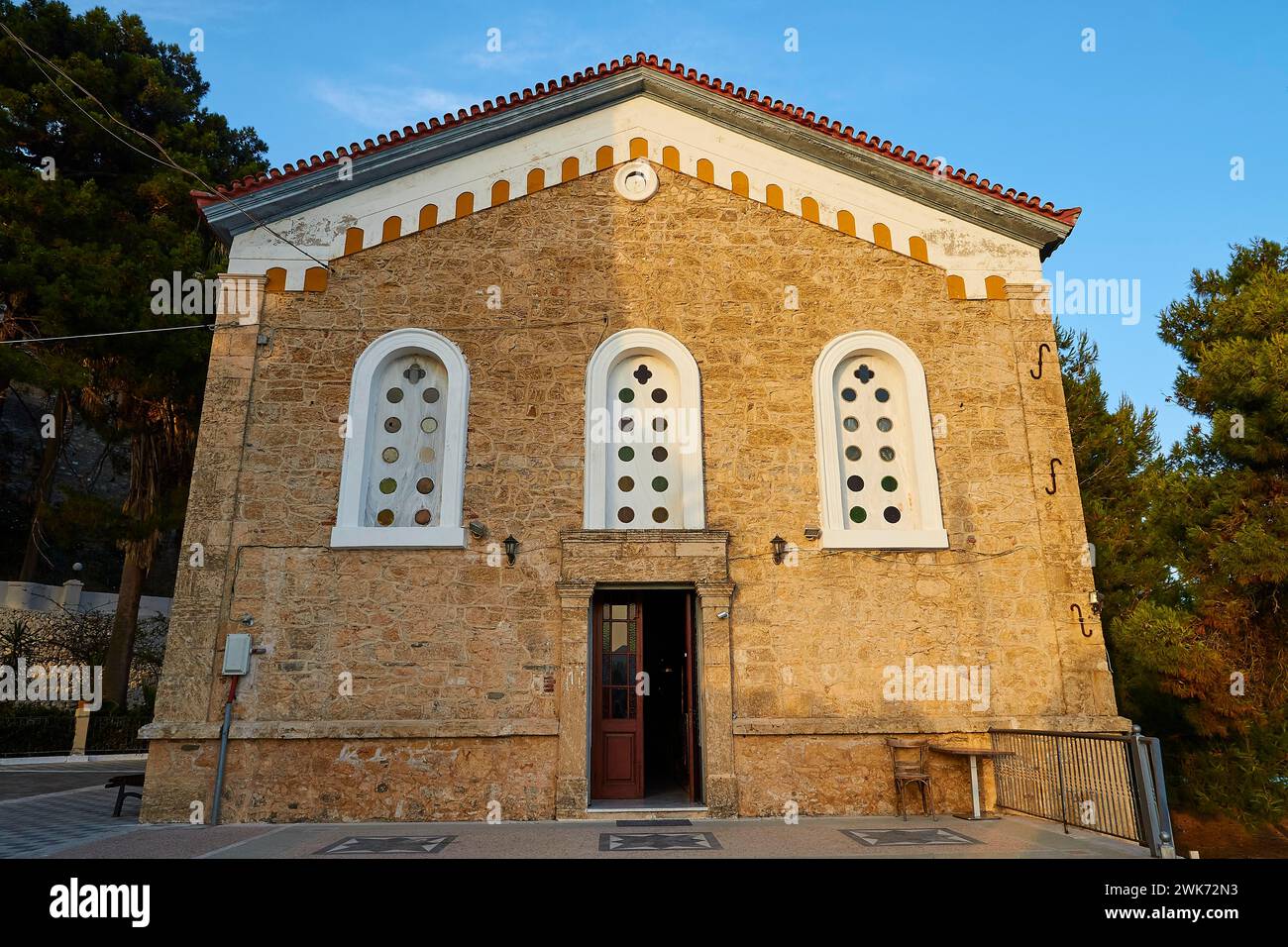 Historic church with striking stone facade and symmetrical windows ...