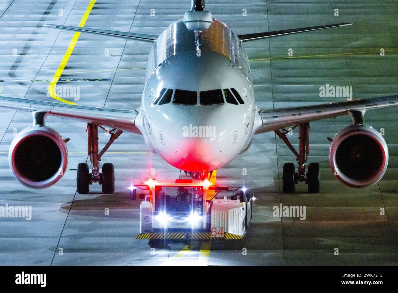 19 February 2024, Hesse, Frankfurt/Main: An aircraft tug tows a ...