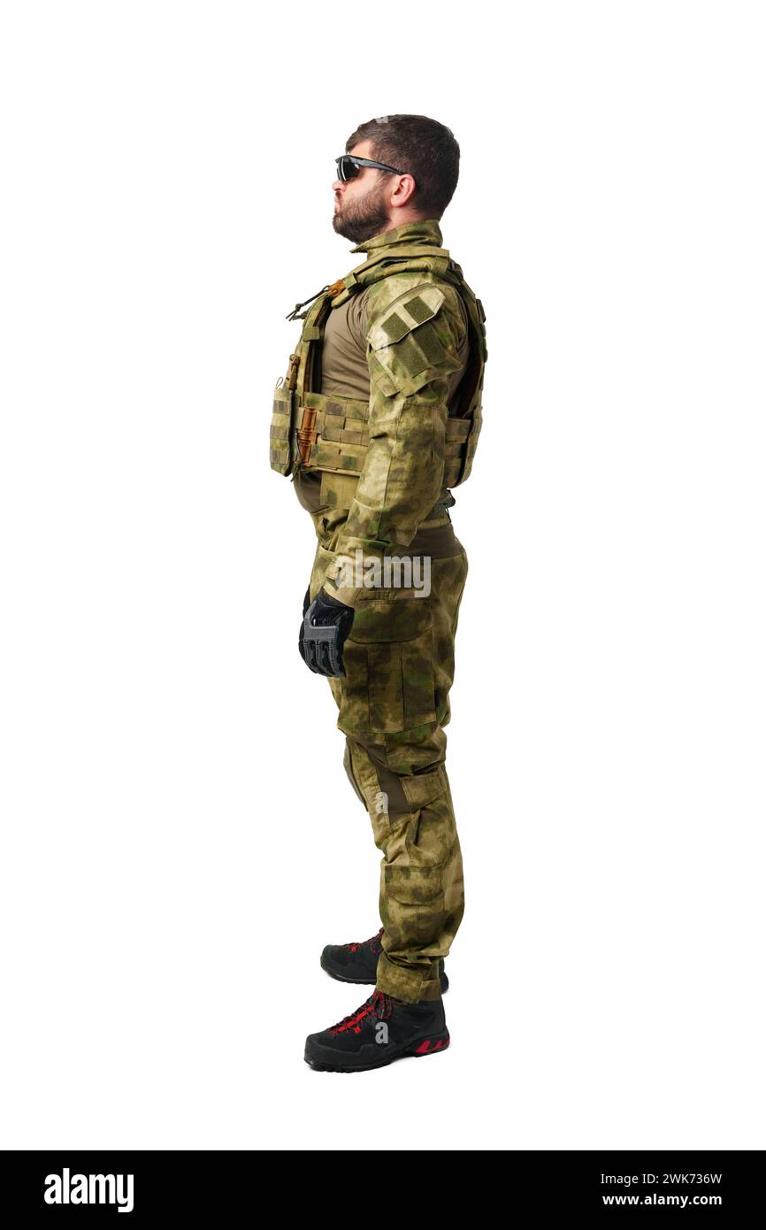 Full length portrait of man soldier wearing ammunition on white ...