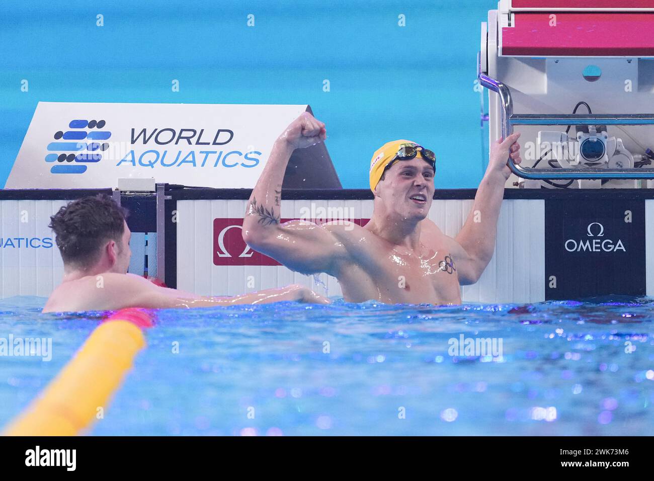 Doha, Qatar. 18th Feb, 2024. Isaac Cooper (R) of Australia celebrates ...
