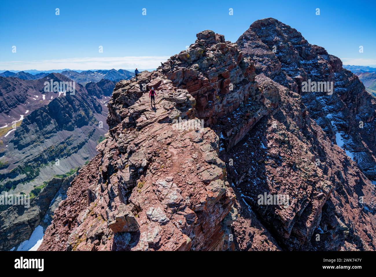 Climbing down from the summit of Maroon Peak in the Maroon Bells ...