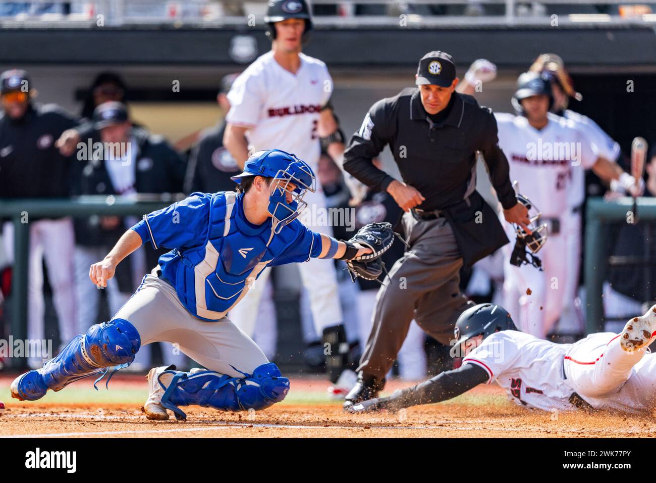 UNC Asheville catcher Coleman McGinnis (15) almost tags Georgia ...