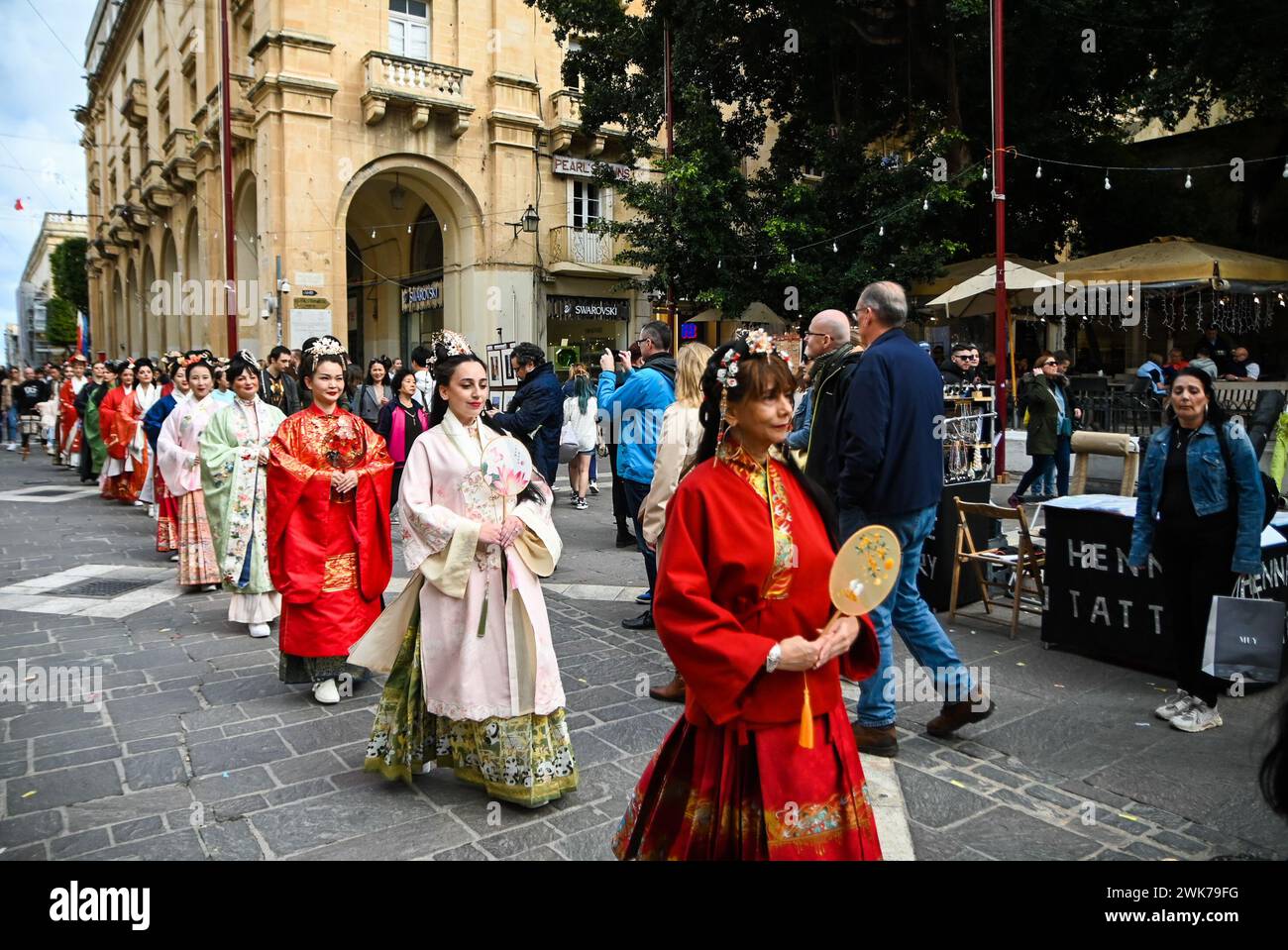 Beijing, Malta. 17th Feb, 2024. Women wearing Chinese costumes are ...