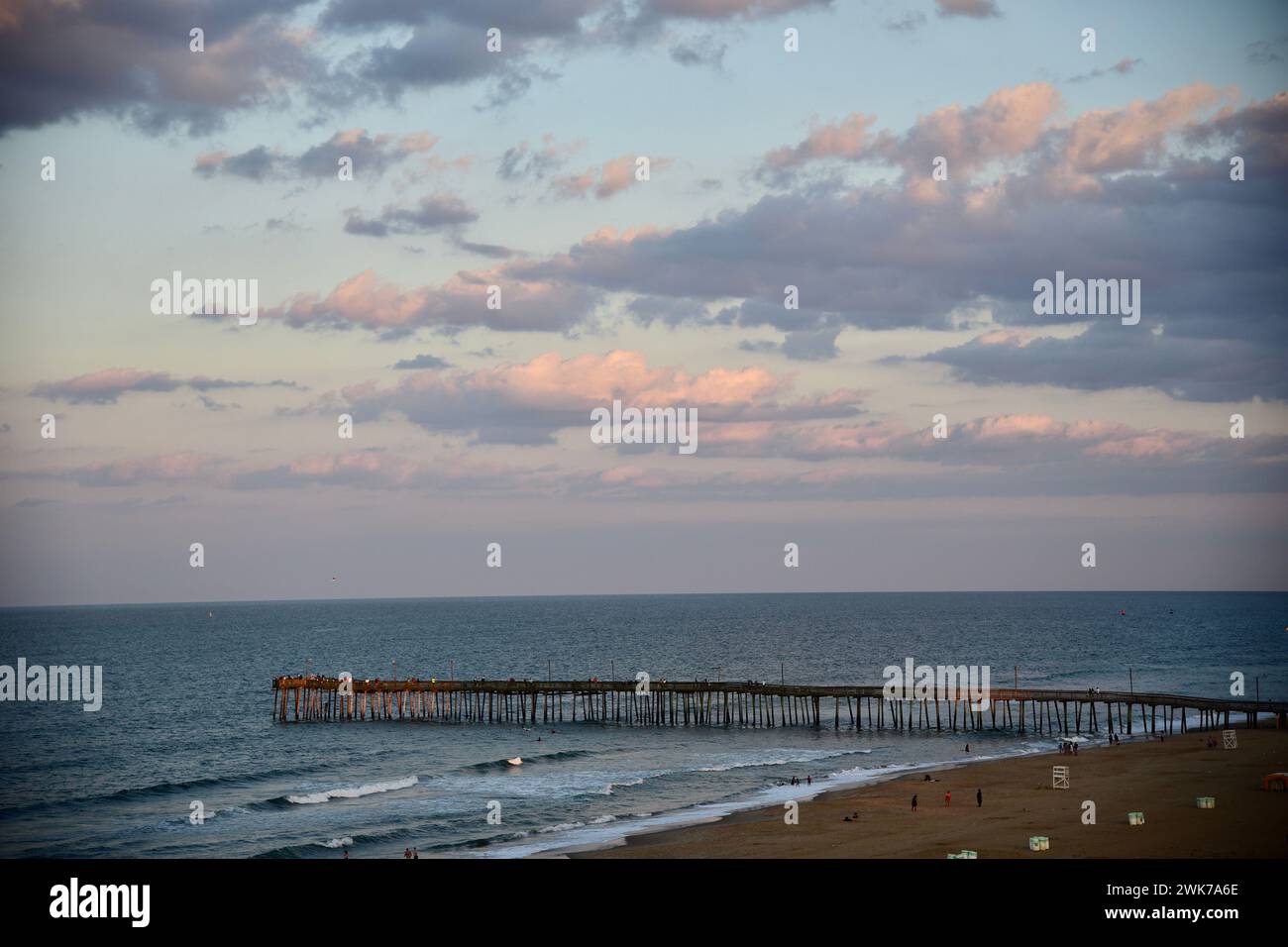 An oceanfront pier in Virginia Beach, Virginia at sunset Stock Photo ...