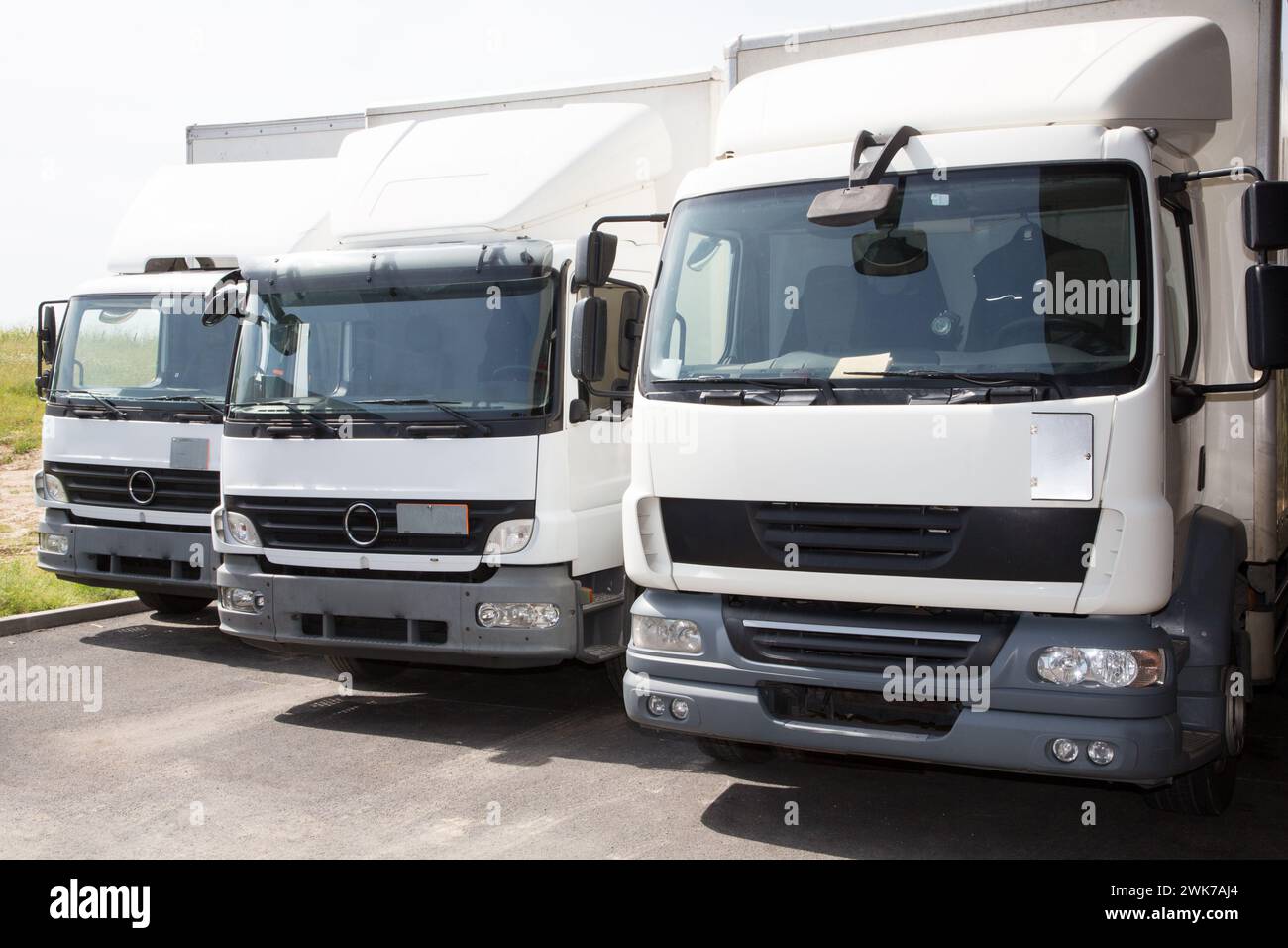transport service company delivery and service van trucks front of ...