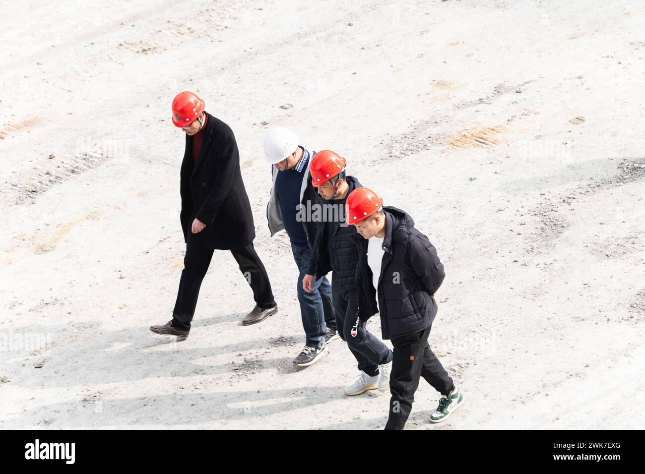 Workers checking quality at construction site Stock Photo - Alamy