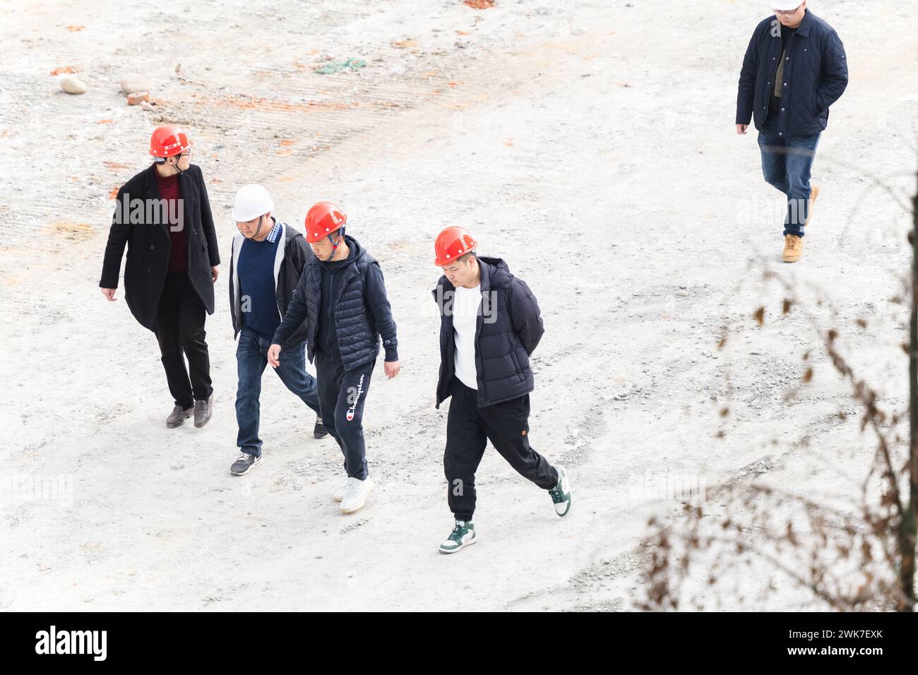 Workers checking quality at construction site Stock Photo - Alamy
