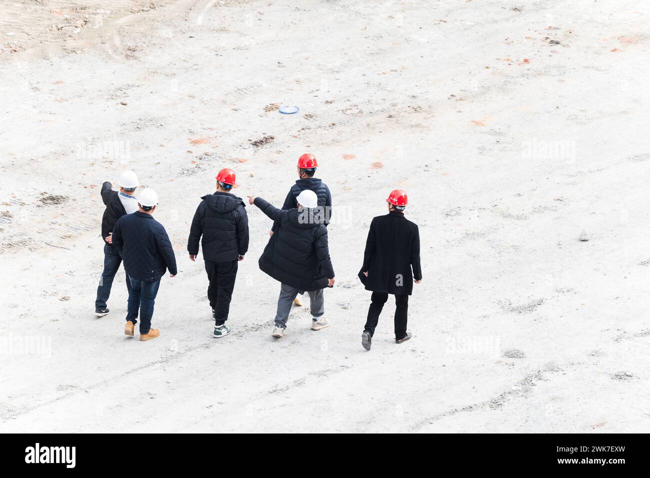 Workers checking quality at construction site Stock Photo - Alamy