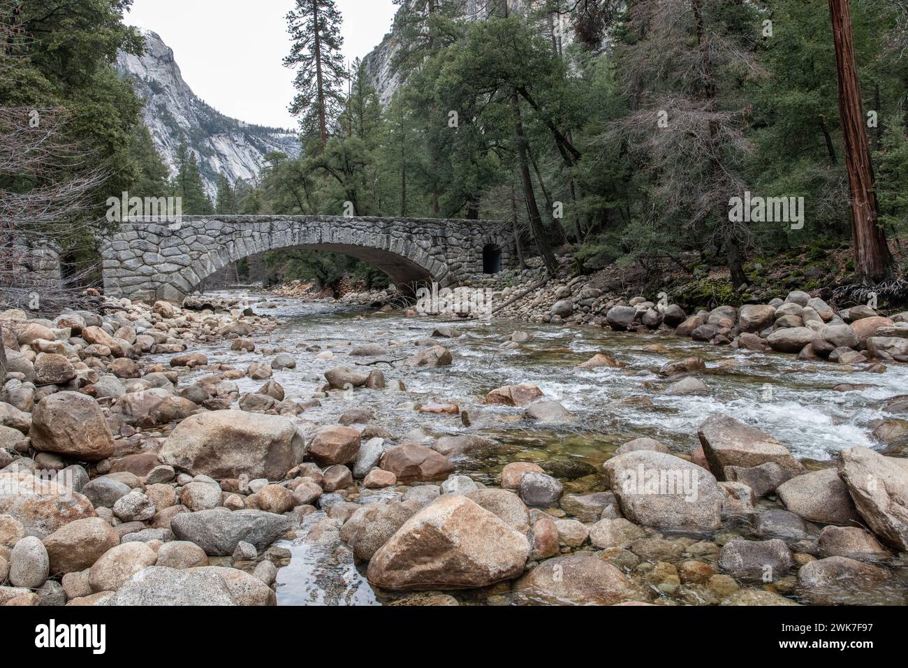 The old stone Happy Isles bridge over the Merced river in Yosemite ...