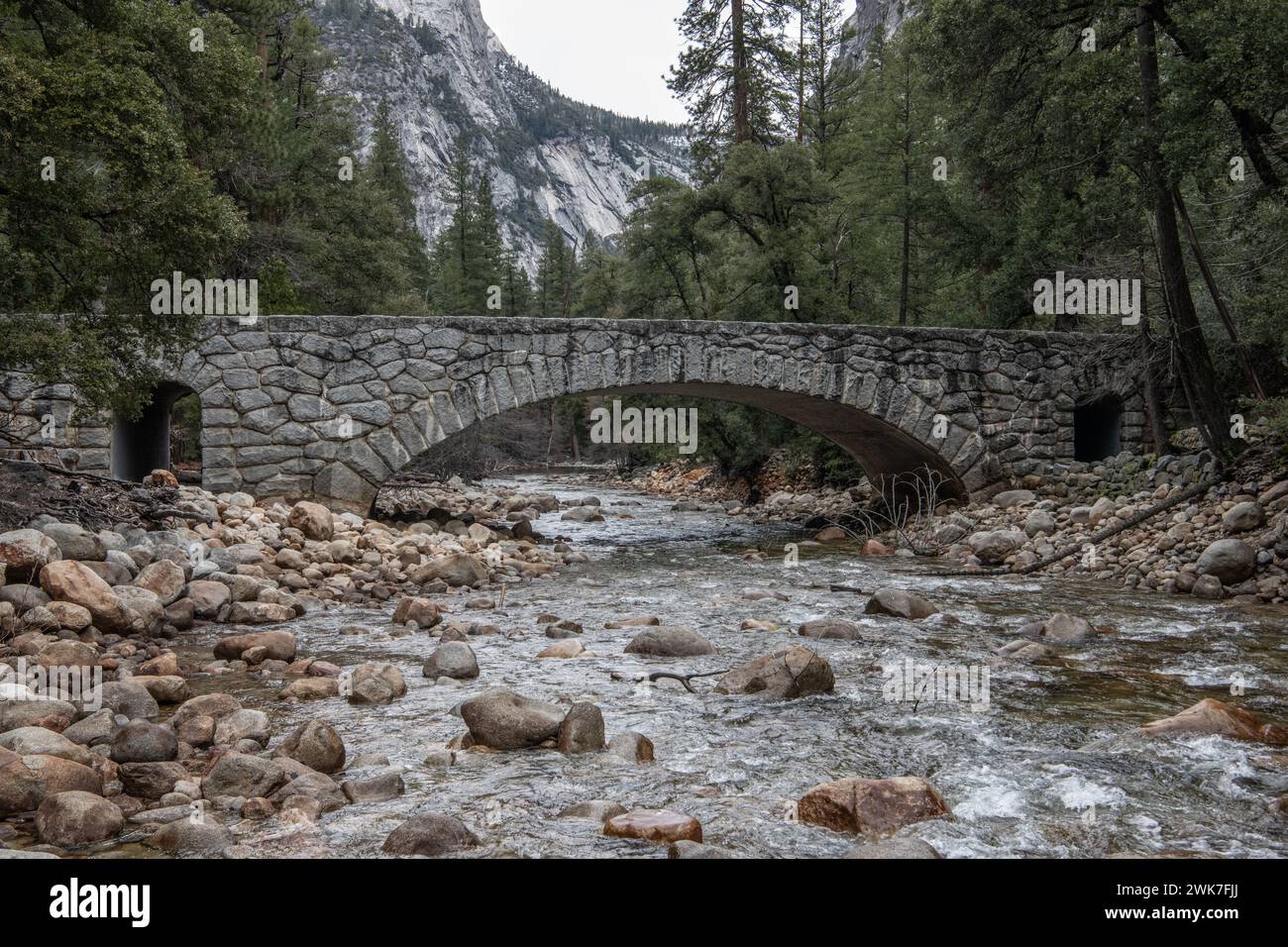 The stone Happy isles bridge over the Merced River in Yosemite National Park in the Sierra ...