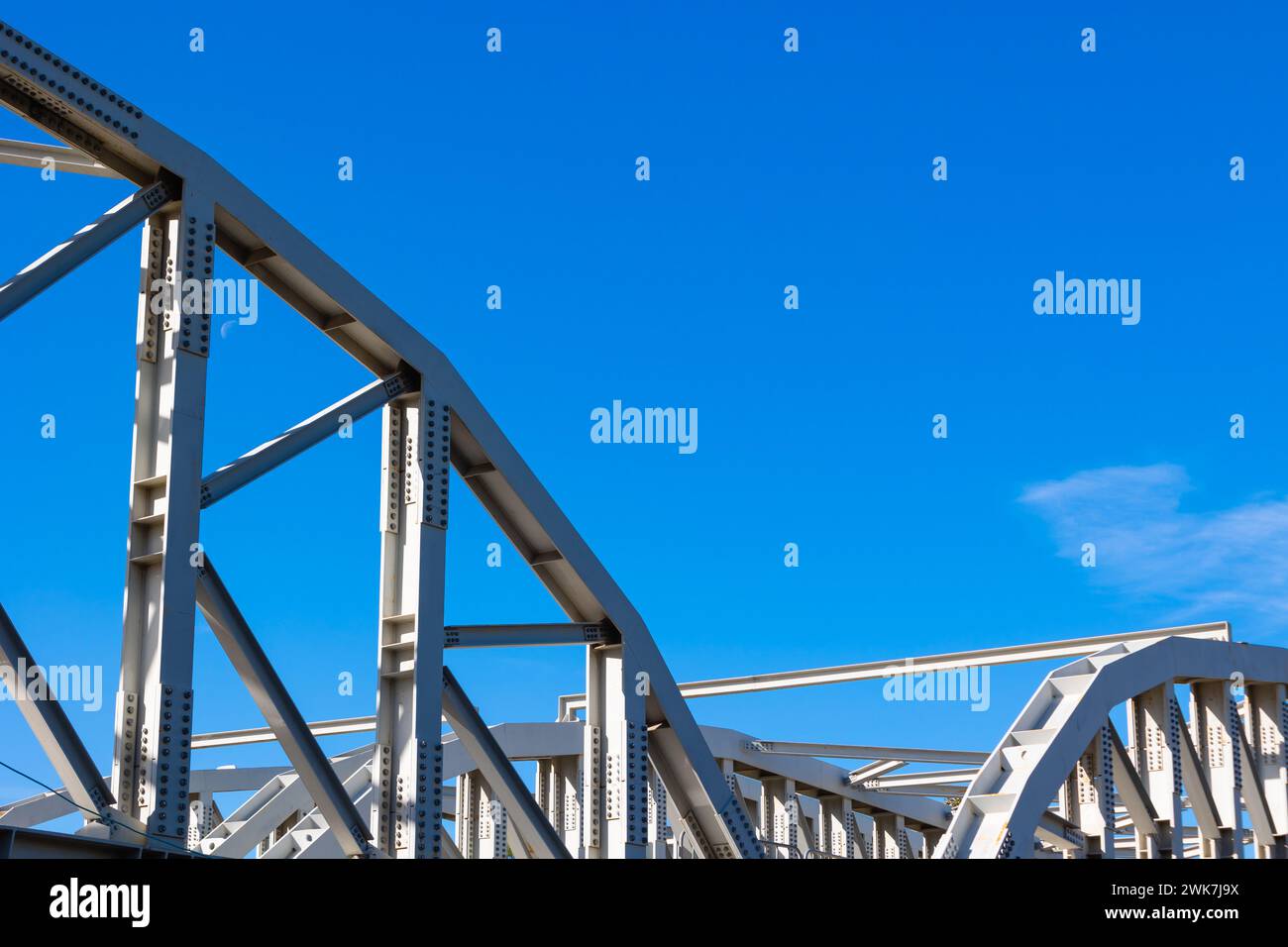 Arches of steel railway or railroad bridge. Modern railroad ...