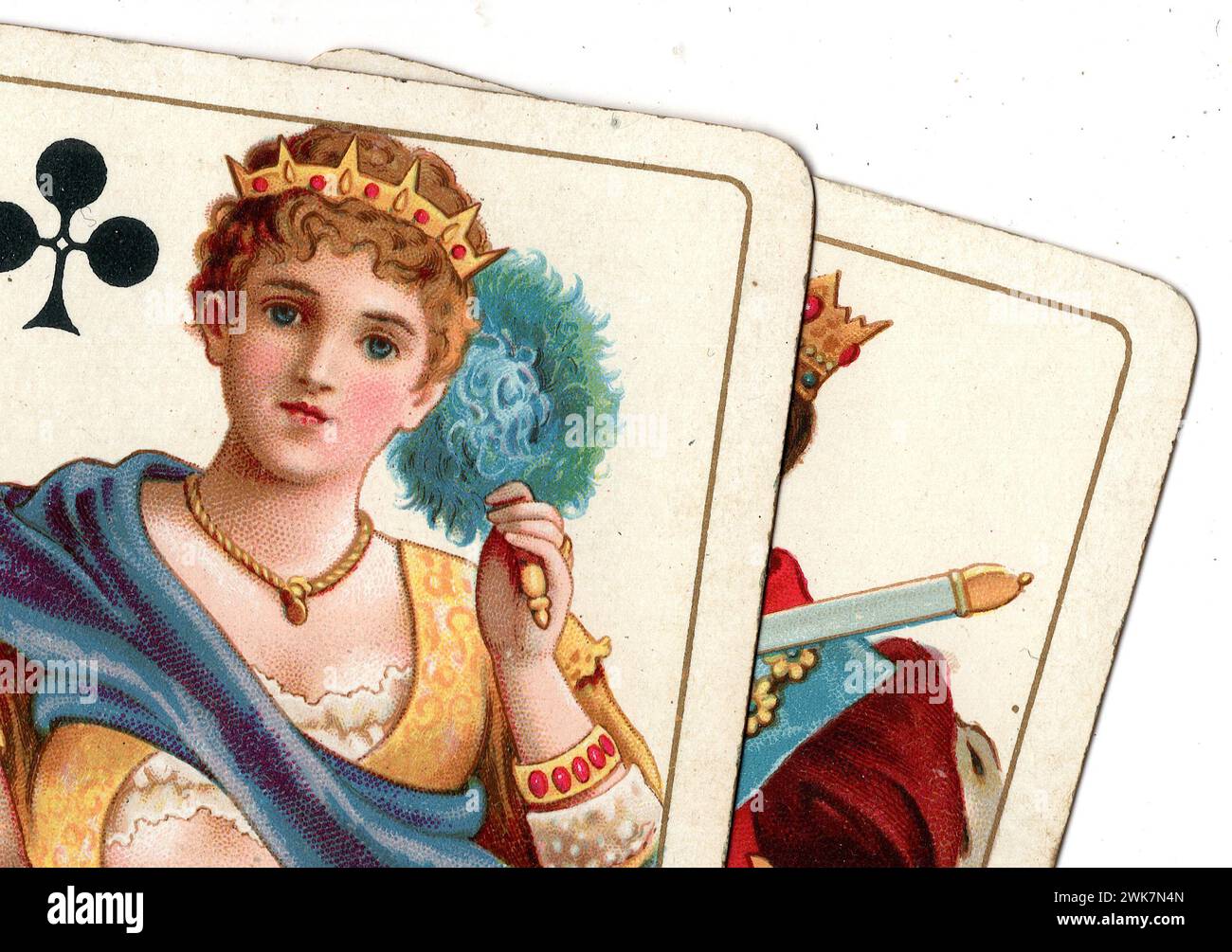 Close up of vintage king and queen of clubs playing cards isolated on a ...