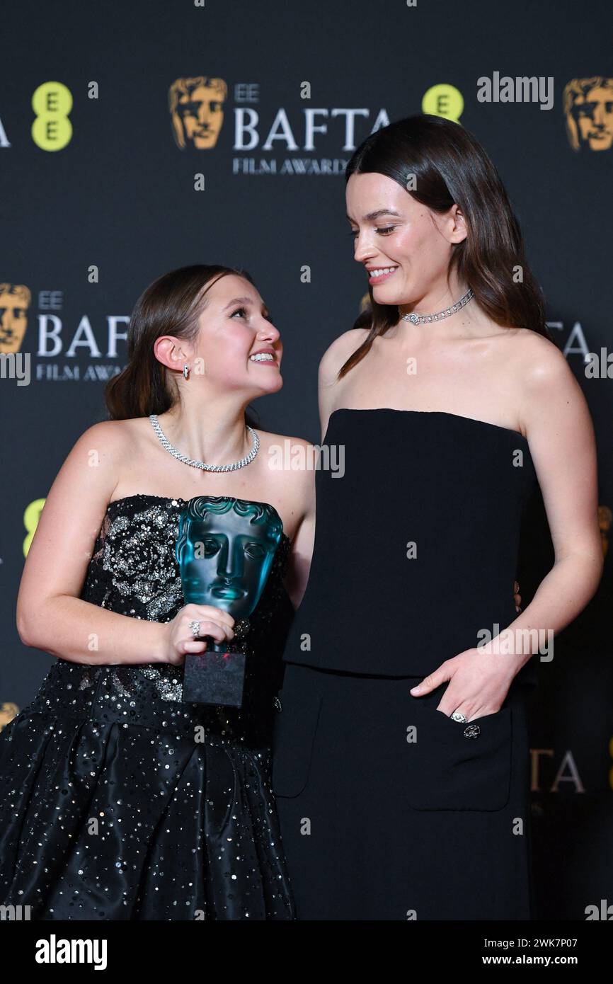London, UK. 18th Feb, 2024. Mia Mckenna-Bruce and Emma Mackey pose with ...