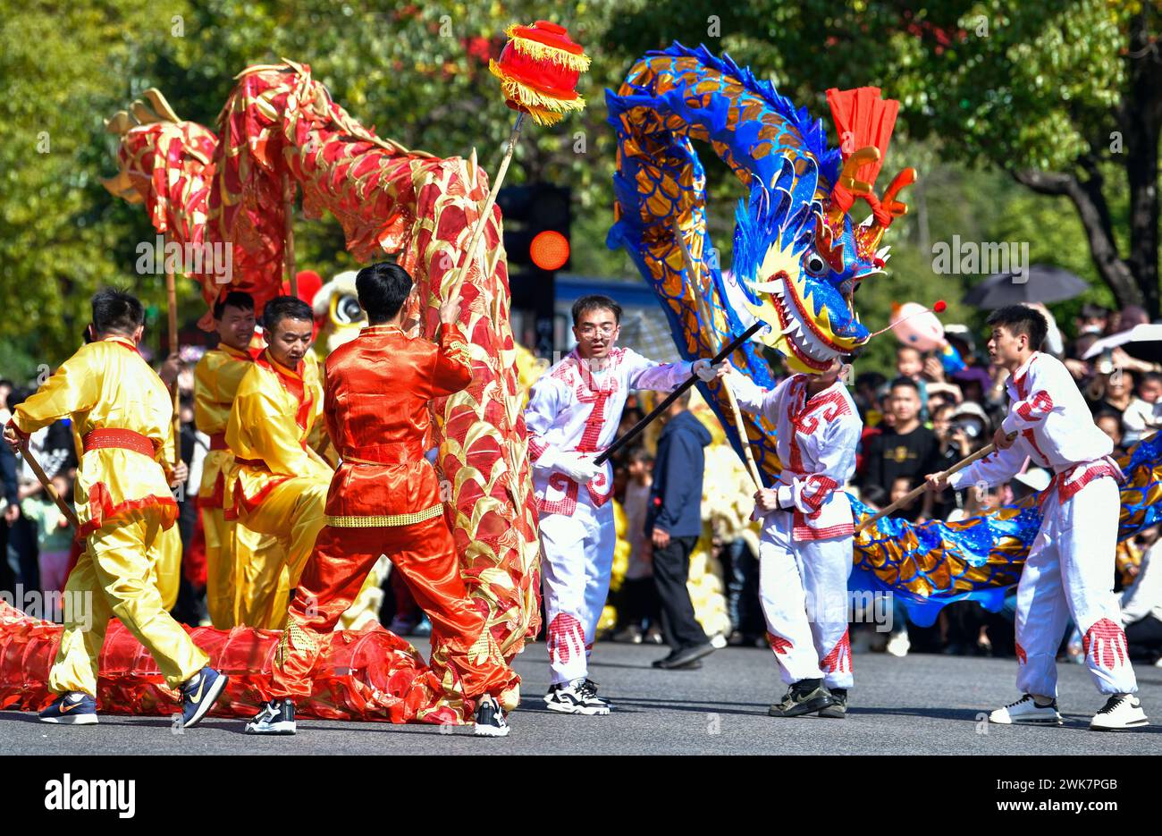 Longli, China's Guizhou Province. 18th Feb, 2024. People perform dragon ...