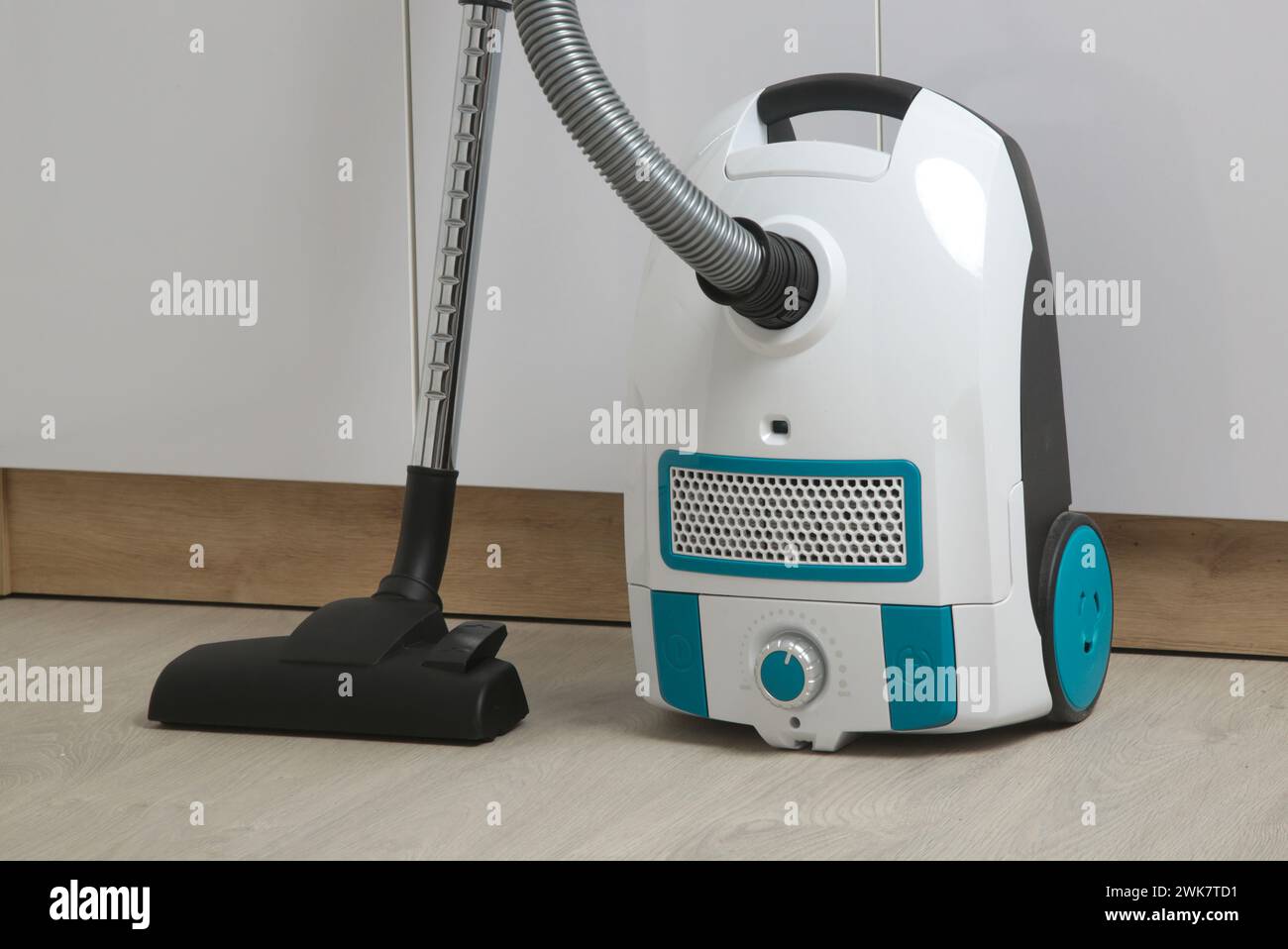 Small and simple vacuum cleaner in the apartment Stock Photo - Alamy